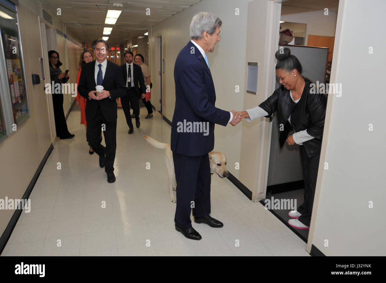 This photo shows U.S. Secretary of State John Kerry and Ben greeting a ...