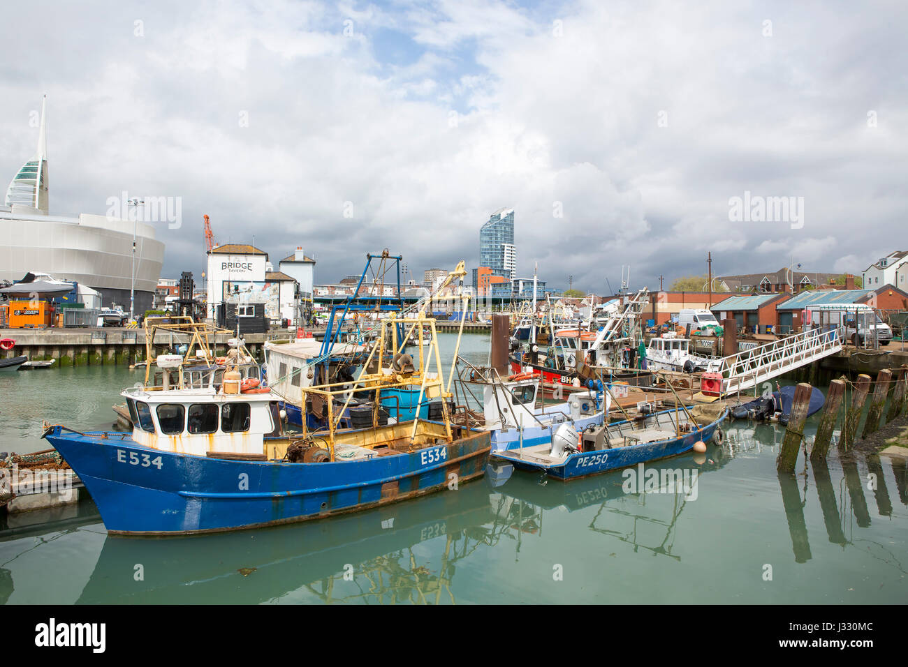 The busy Camber docks in Portsmouth Hampshire. Assortment of fishing ...