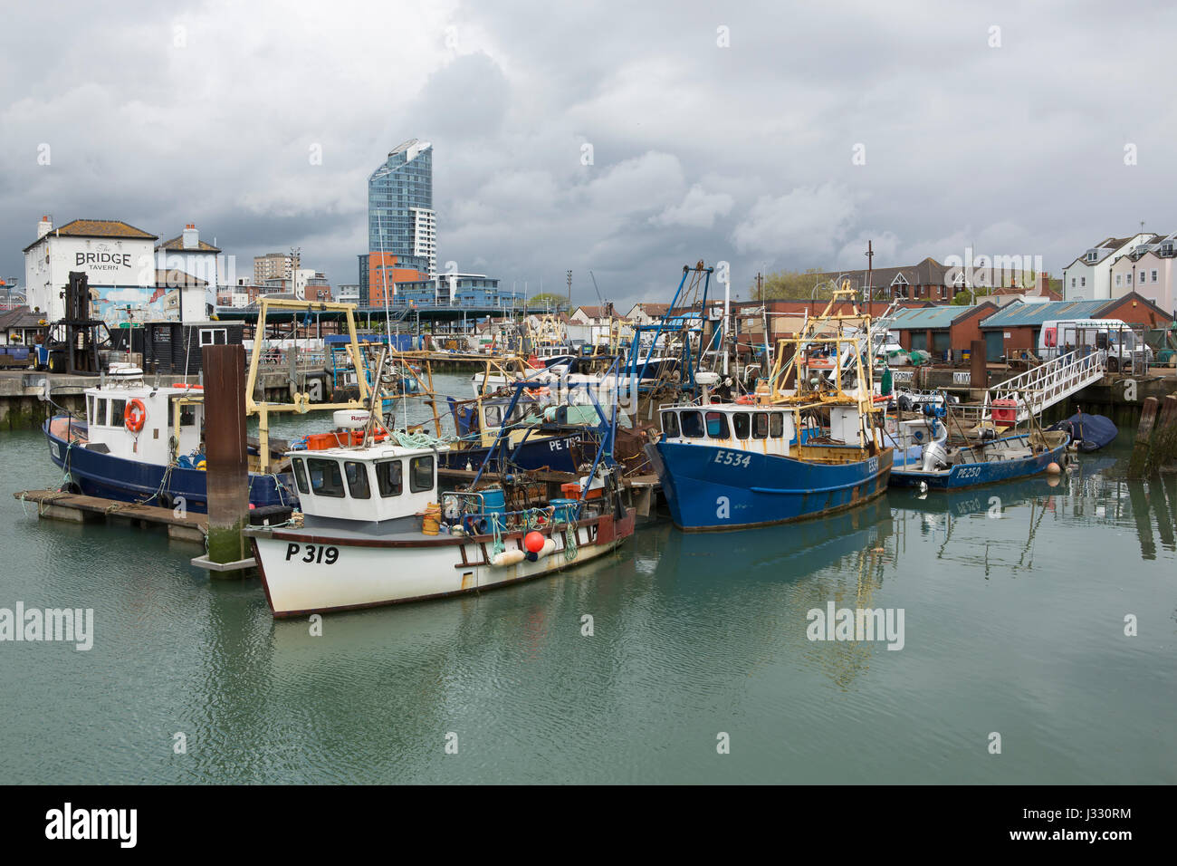 The busy Camber docks in Portsmouth Hampshire. Assortment of fishing ...