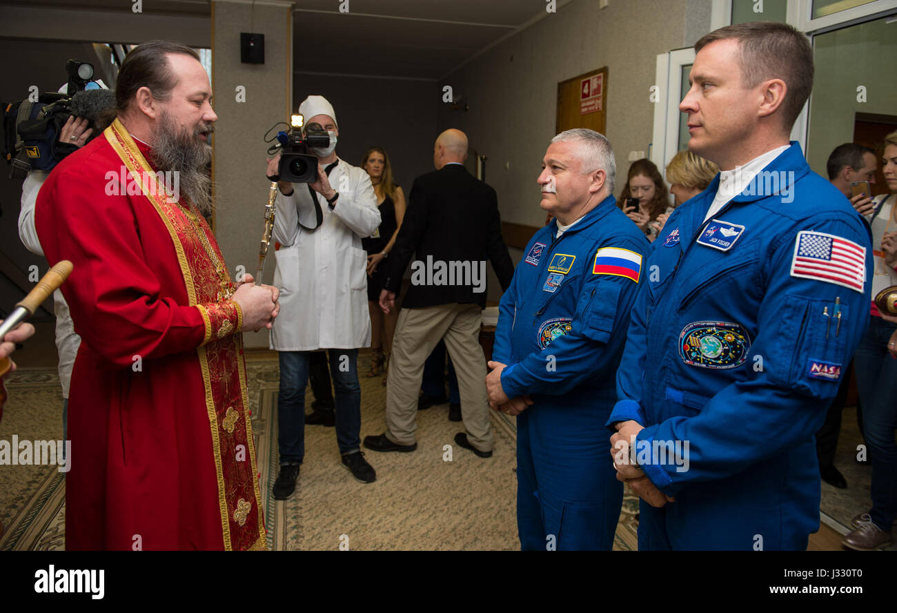 Expedition 51 Soyuz Commander Fyodor Yurchikhin of Roscosmos, left, and ...