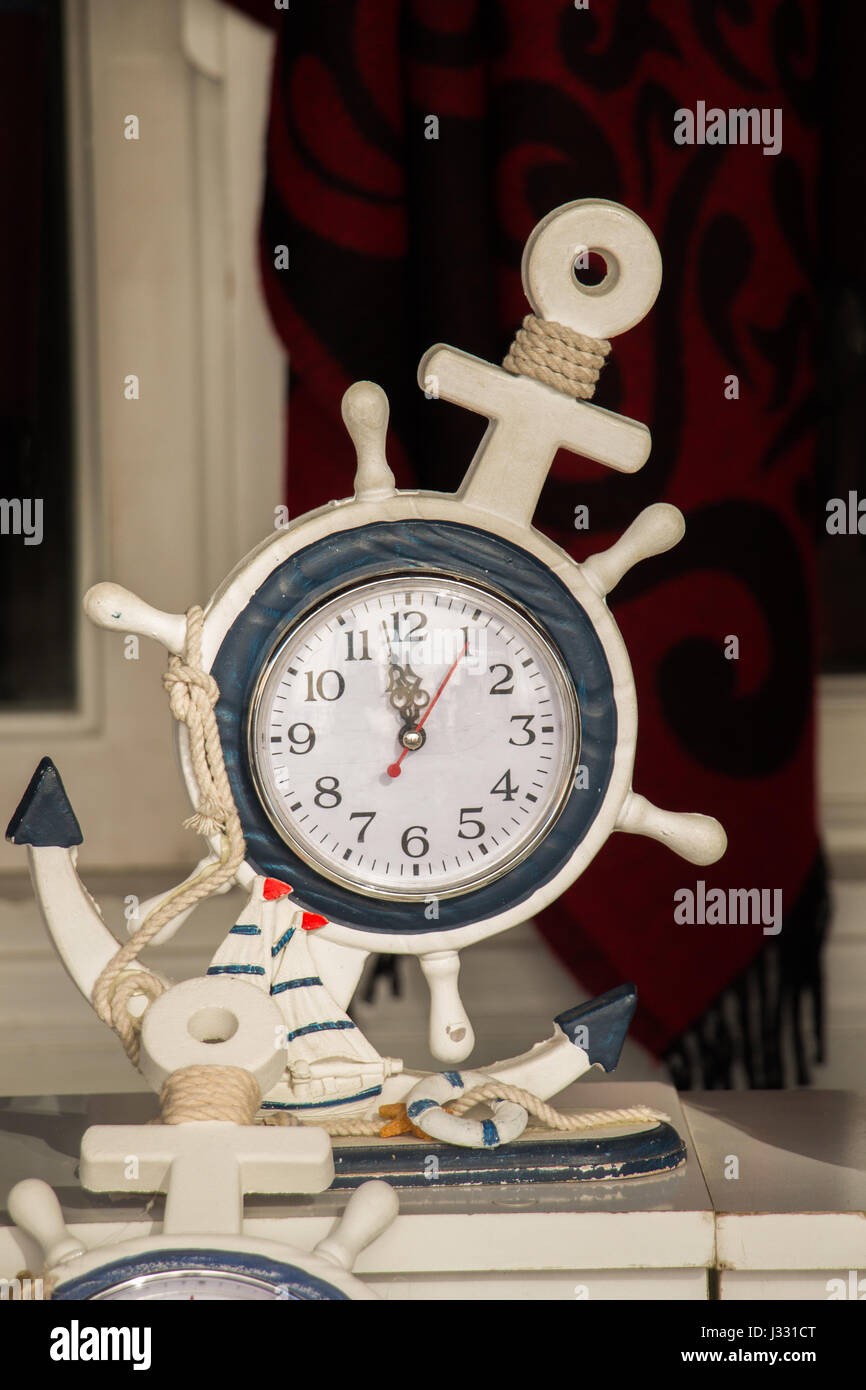 Clock in the shape of a steering wheel Stock Photo - Alamy