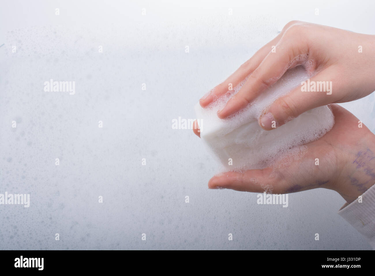 Hand washing and soap foam on a foamy background Stock Photo - Alamy