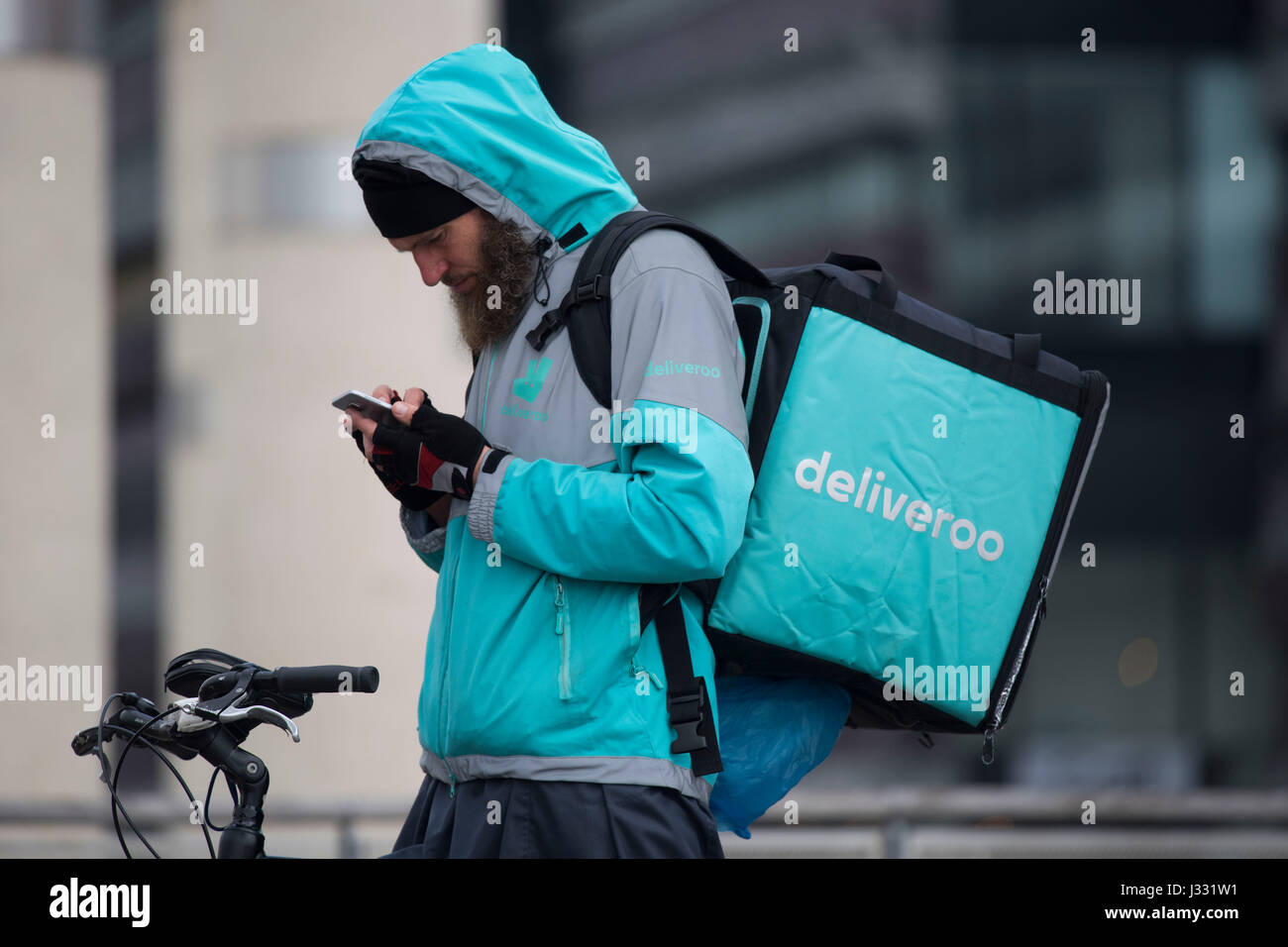Deliveroo Worker On Bike High Resolution Stock Photography and Images ...