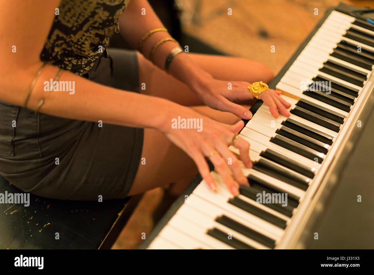 Woman playing a keyboard hi-res stock photography and images - Alamy