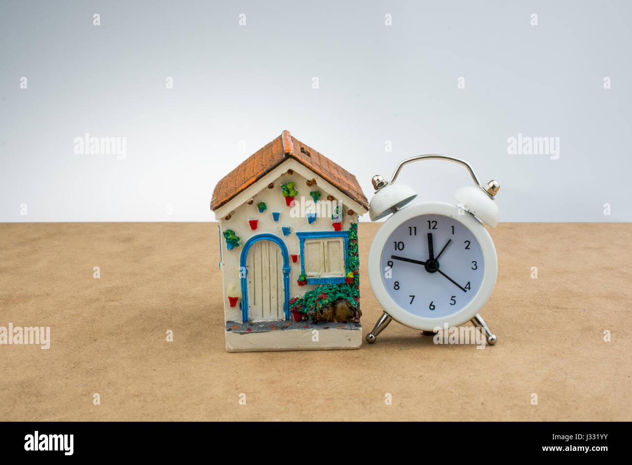 House model alarm clock hi-res stock photography and images - Alamy