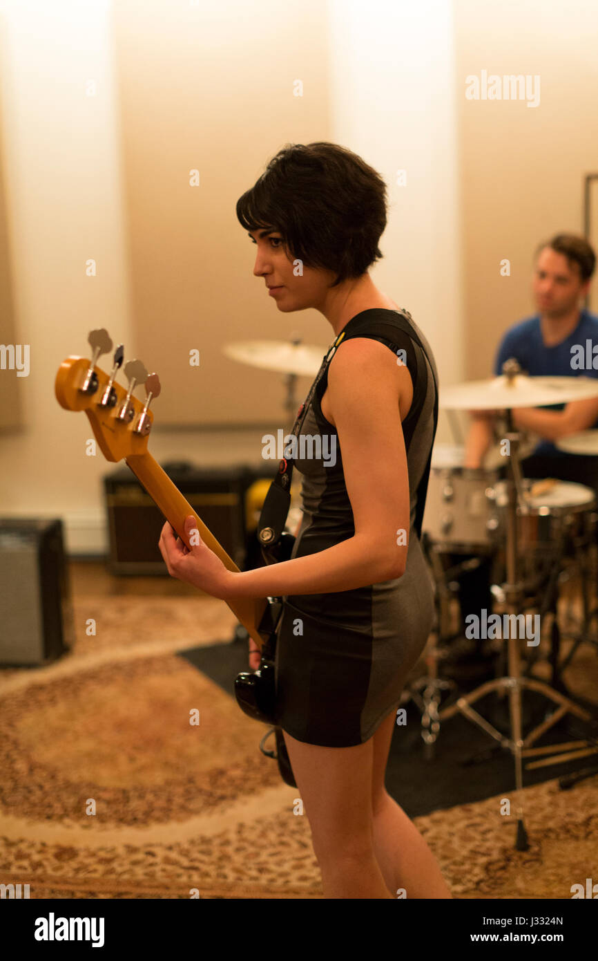 Young musicians practicing at a rehearsal space Stock Photo - Alamy