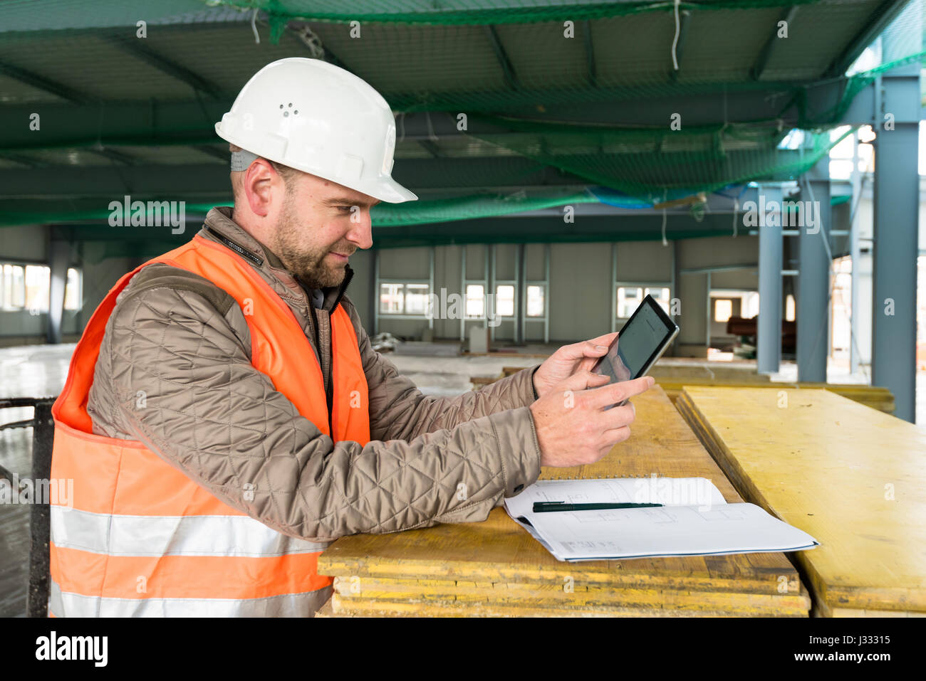 Engineer checks data new construction hi-res stock photography and ...