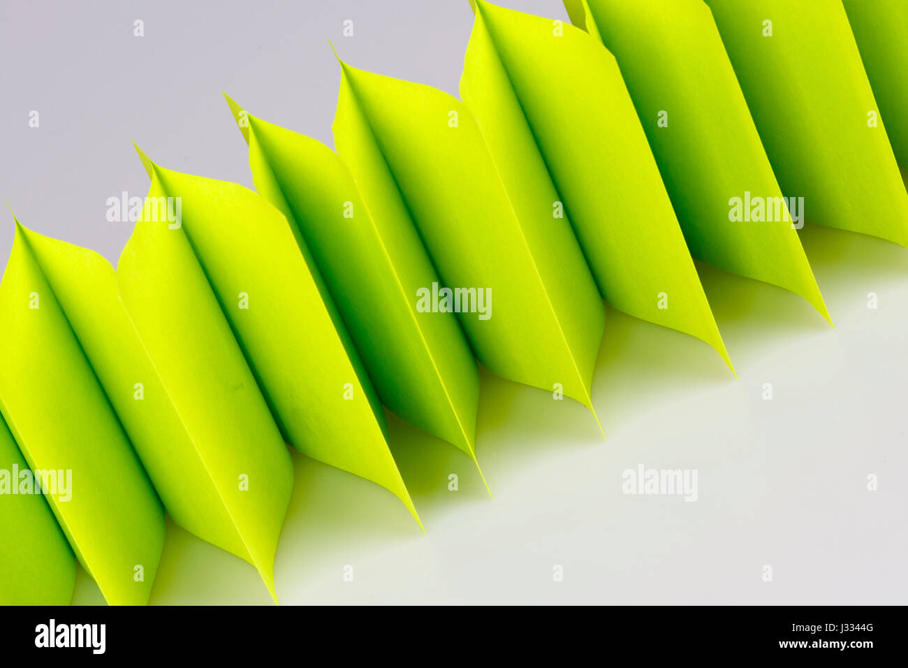Abstract green paper fence hi-res stock photography and images - Alamy