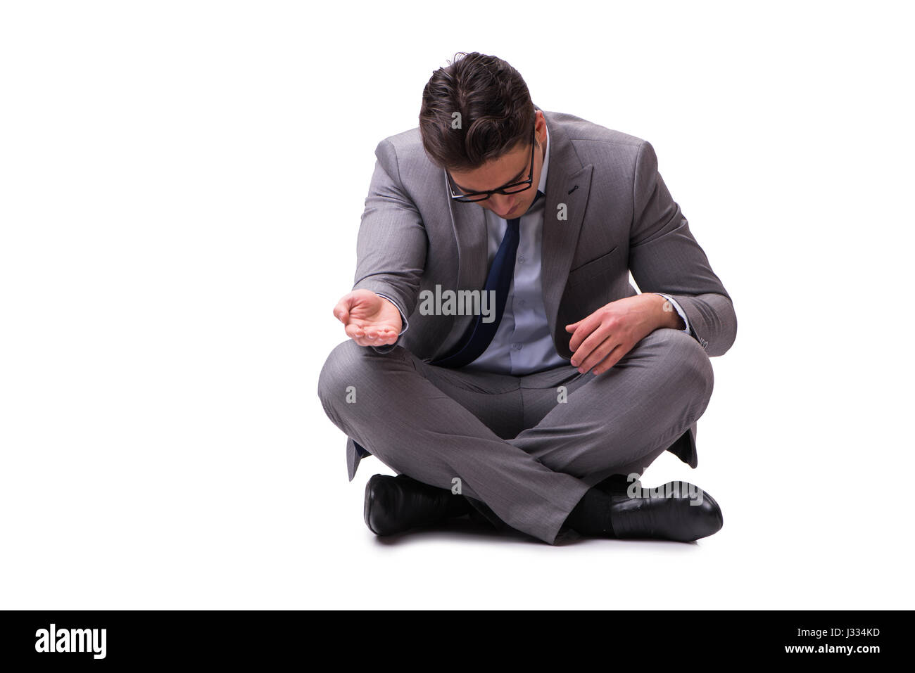 Bankrupt businessman isolated on white background Stock Photo - Alamy