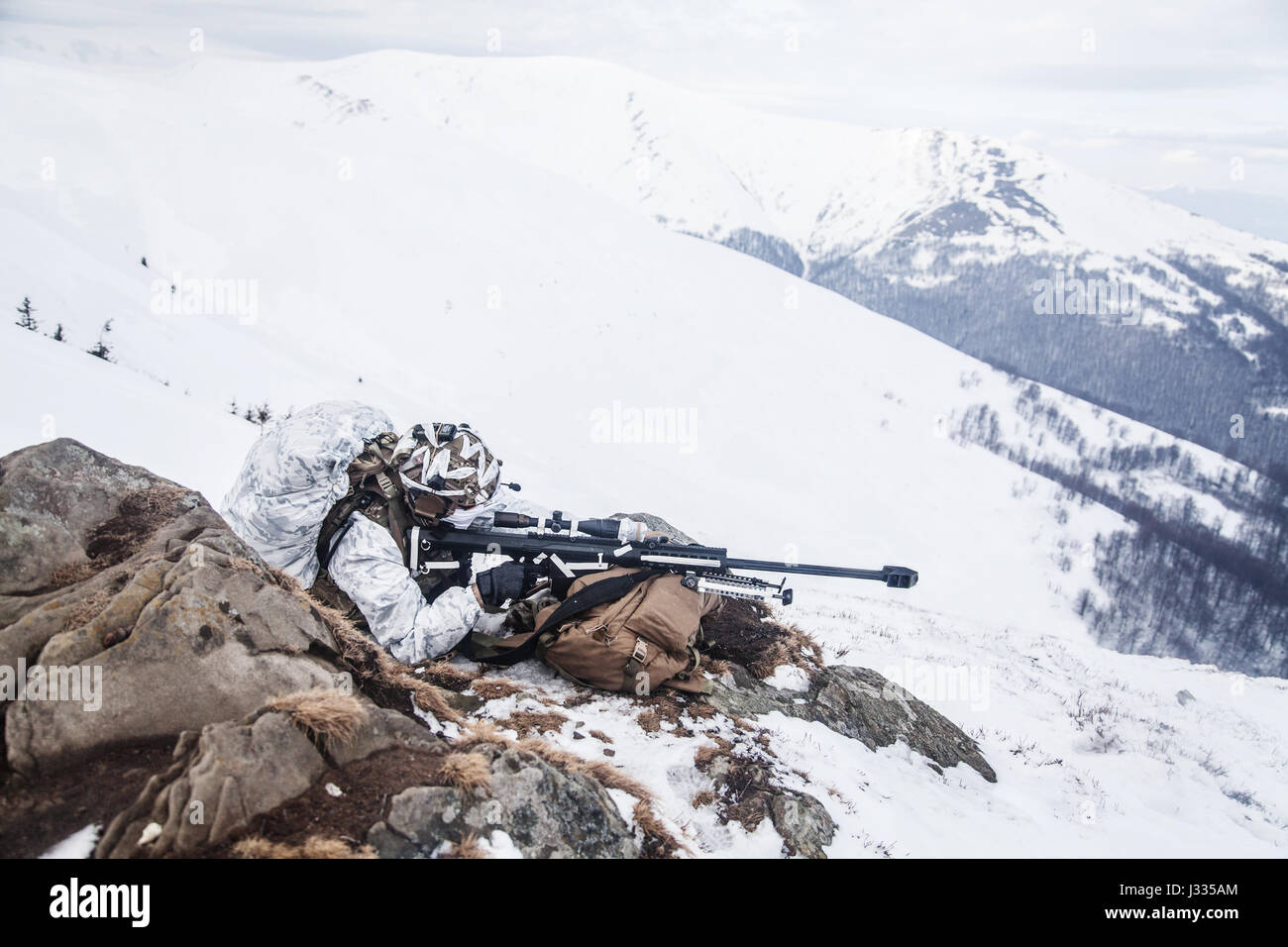 Winter arctic mountains warfare Stock Photo - Alamy