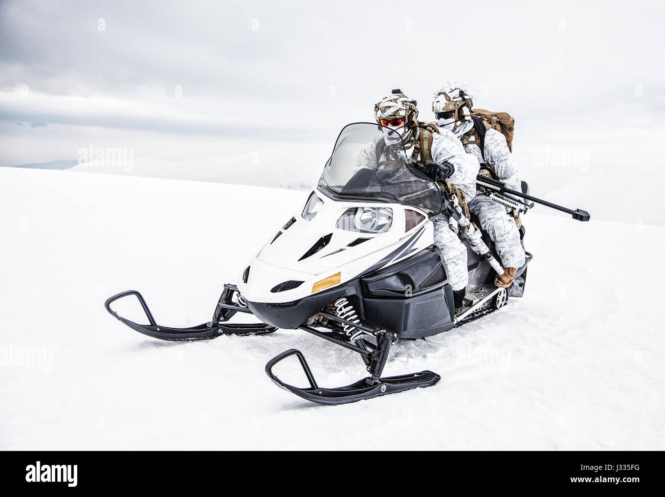 Army snowmobile hi-res stock photography and images - Alamy