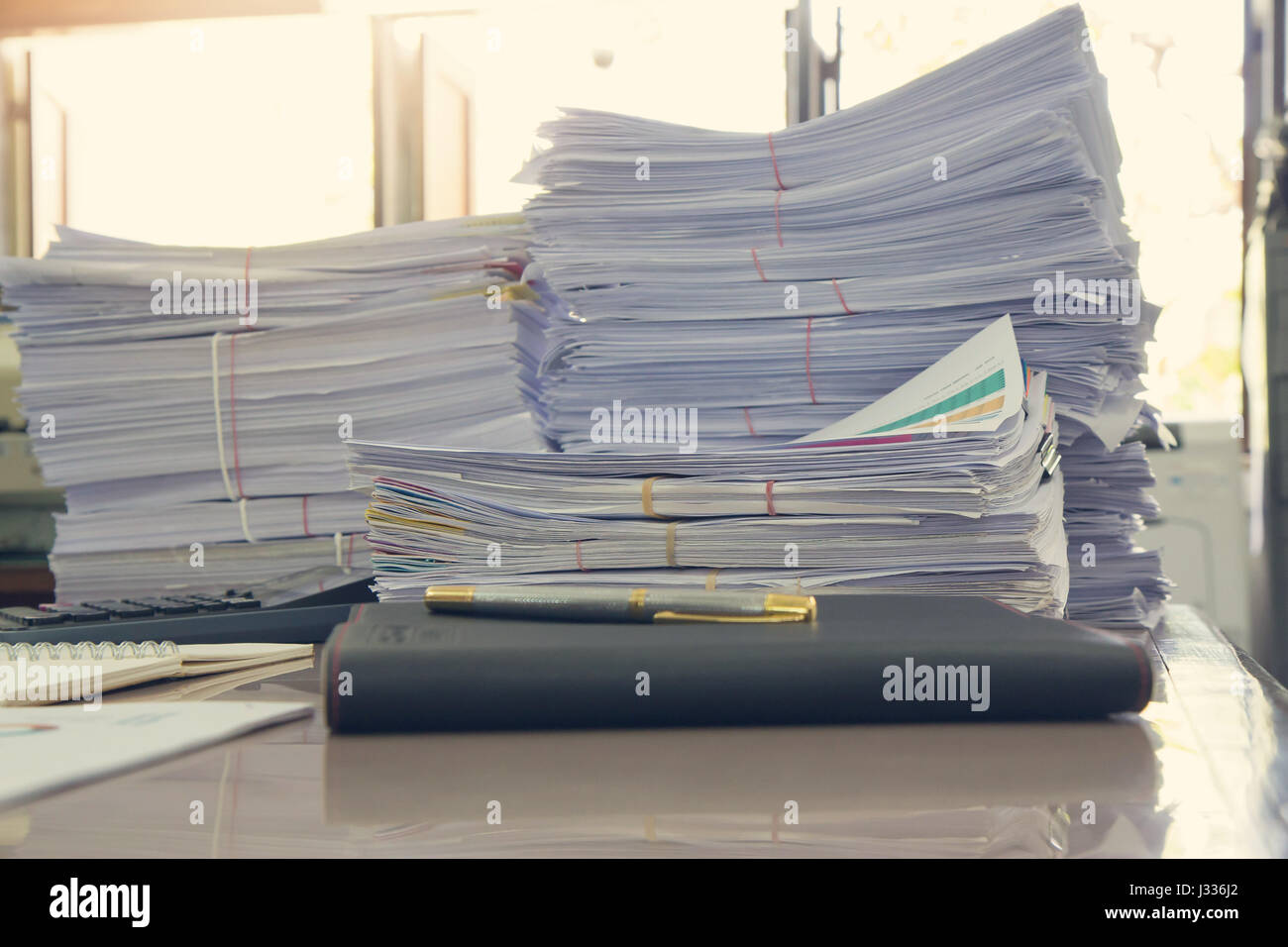 Business Concept, Pile of unfinished documents on office desk, Stack of ...