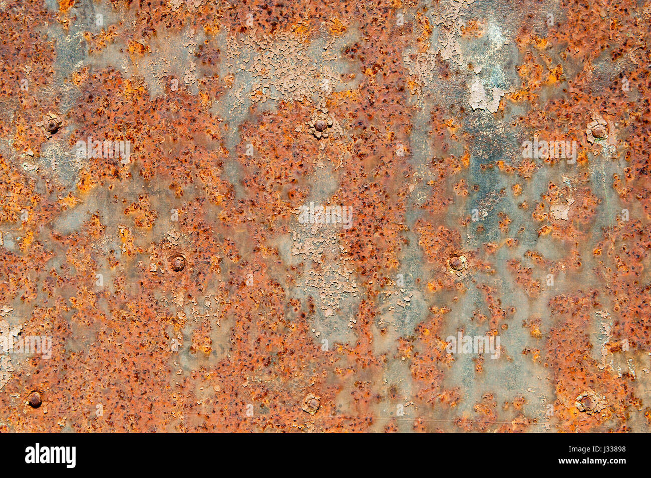 Abstract textured rust metal surface background Stock Photo - Alamy