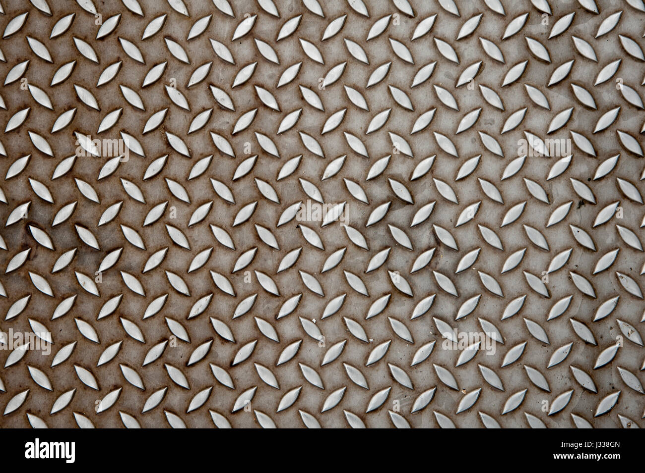 Background of metal diamond plate in silver color Stock Photo - Alamy