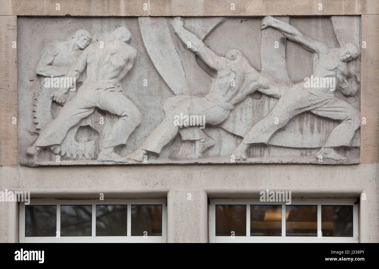 Dangerous workplace. Relief by Hungarian sculptor Mihaly Biro on the ...