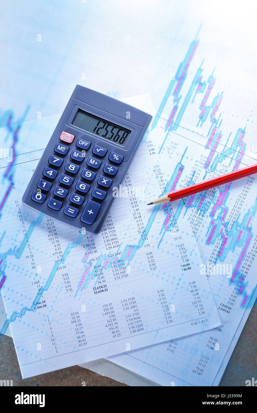 Operating budget, calculator and pencil in closeup Stock Photo - Alamy