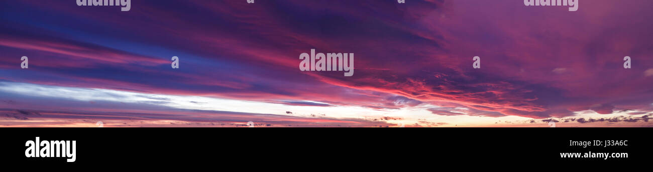 Sunset horizontal sky panorama with sparkling colours Stock Photo - Alamy