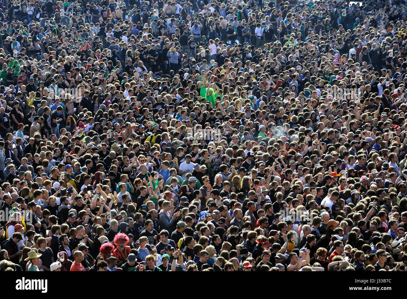 cheering fans at a rock concert outside, Rock am Ring, Nuerburgring ...