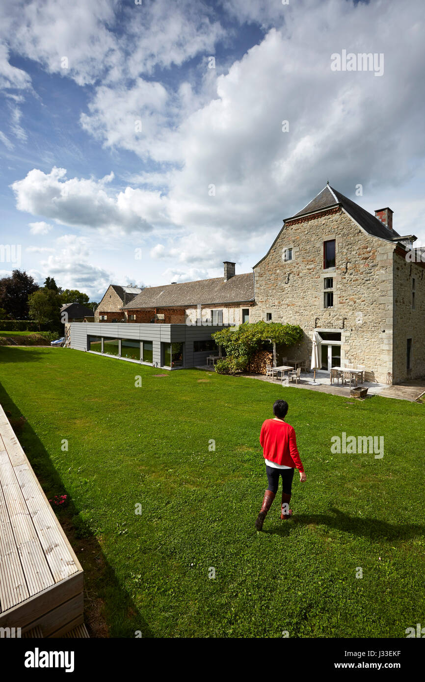 Woman in the garden of Le Cor de Chasse, food hotel by Michelin starred ...