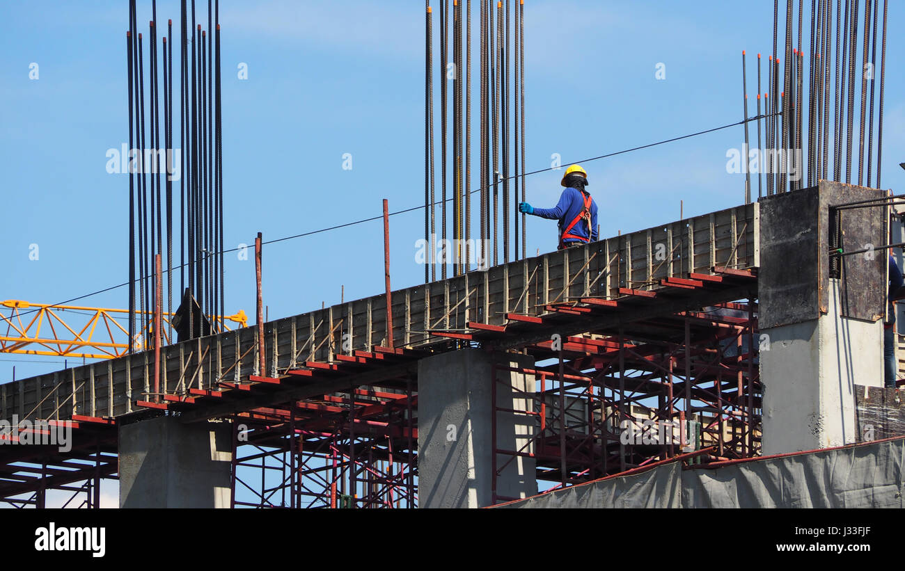 Labor or worker on building construction site and industial material ...