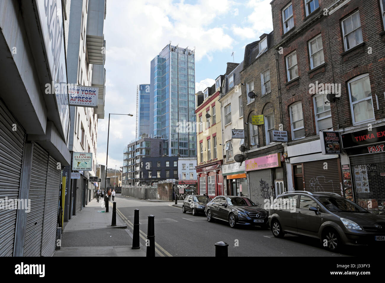 View of old 19th C terraced shops on White Church Lane with view of ...