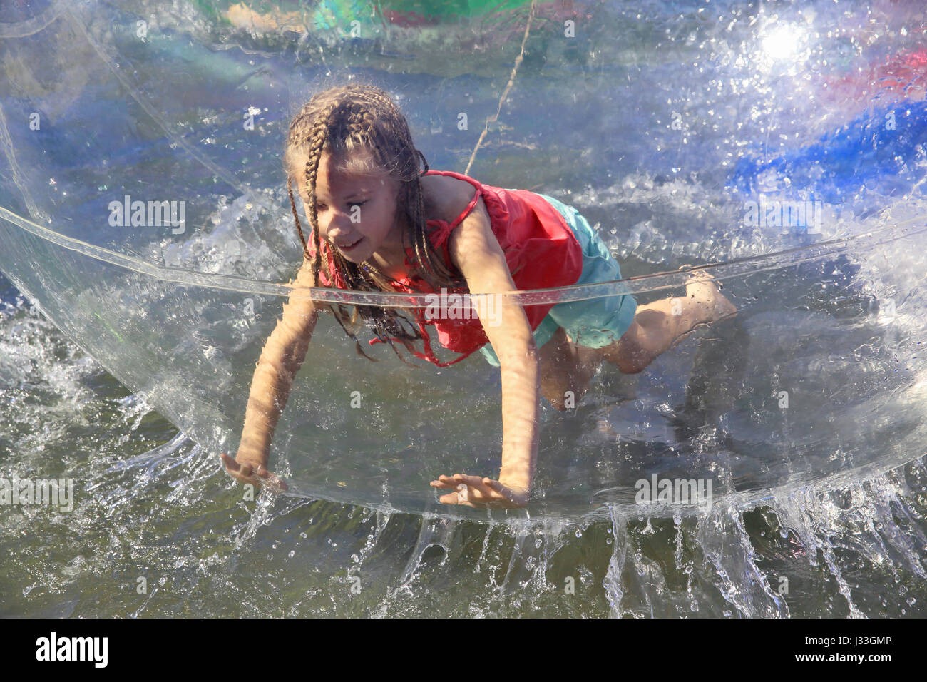 Child in zorb ball hi-res stock photography and images - Alamy
