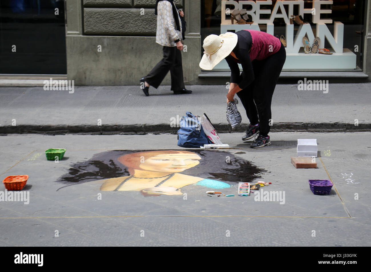 An artist making a street art picture Stock Photo - Alamy