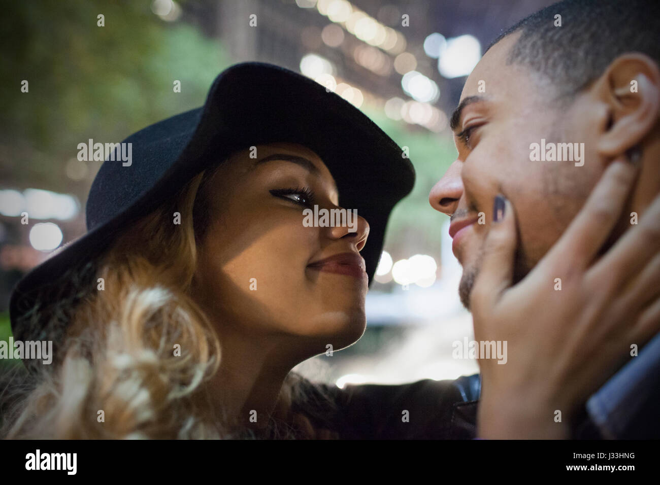 Young couple gazing lovingly into each other's eyes Stock Photo - Alamy
