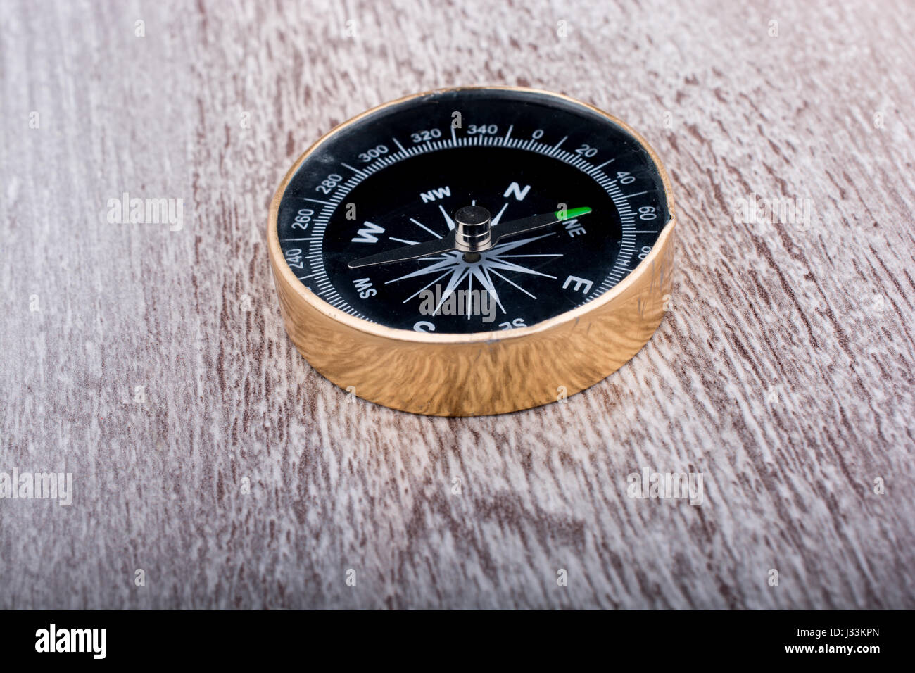 Black color compass instrument for determining directions Stock Photo ...