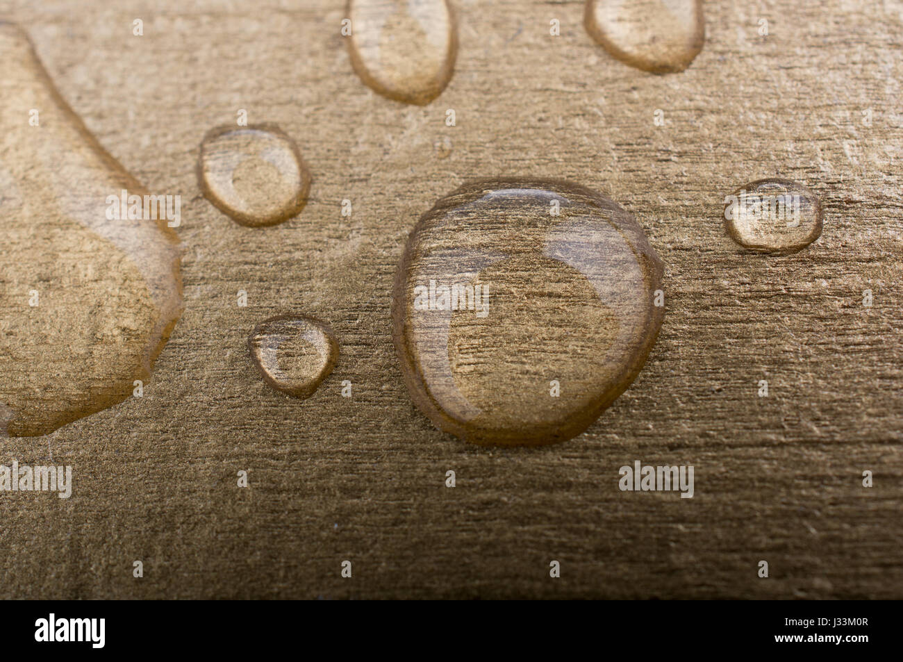 Water drops on a solid surface Stock Photo - Alamy