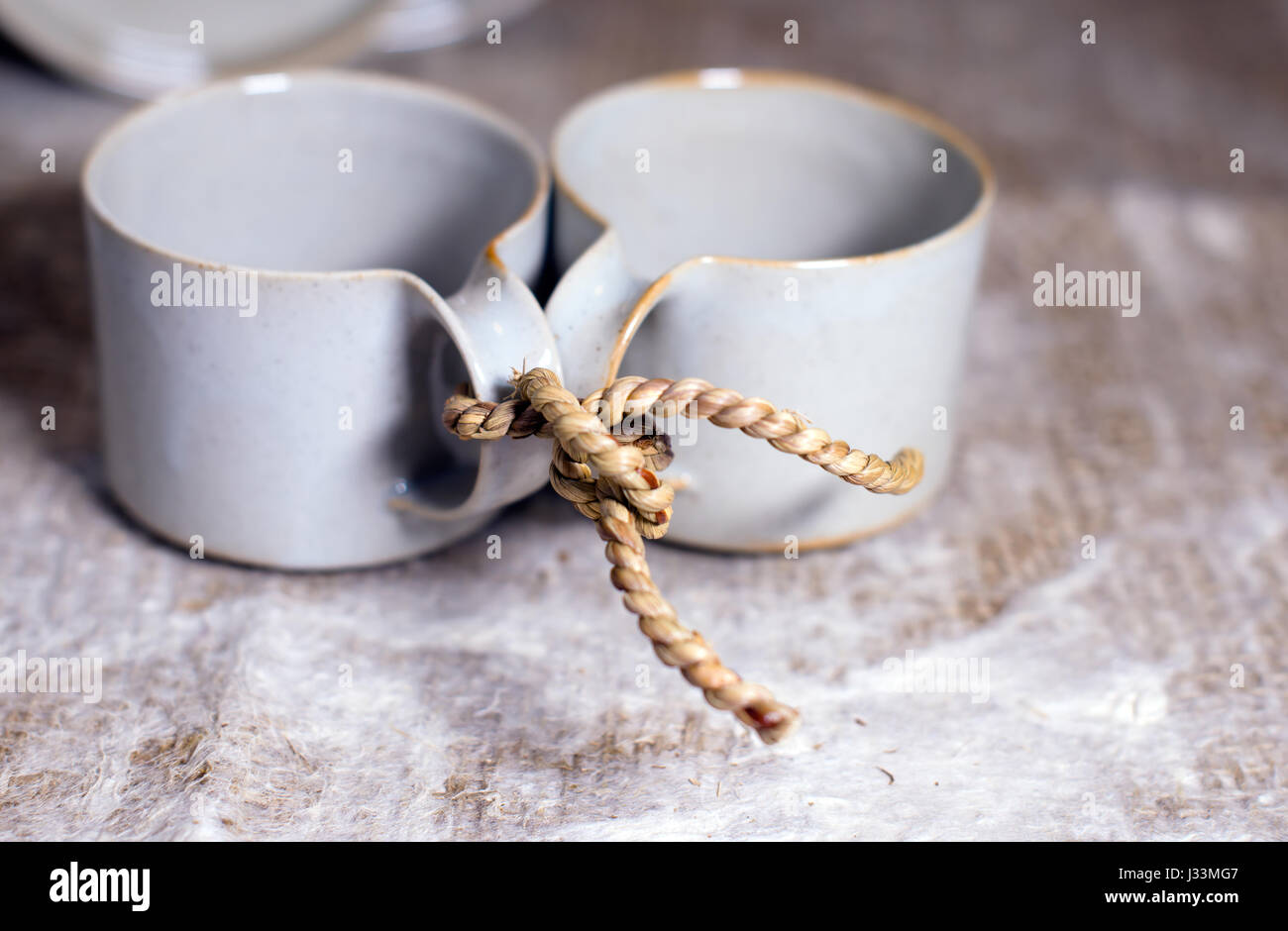 Two mod cups tied by rope together as a symbol of loyalty and ...