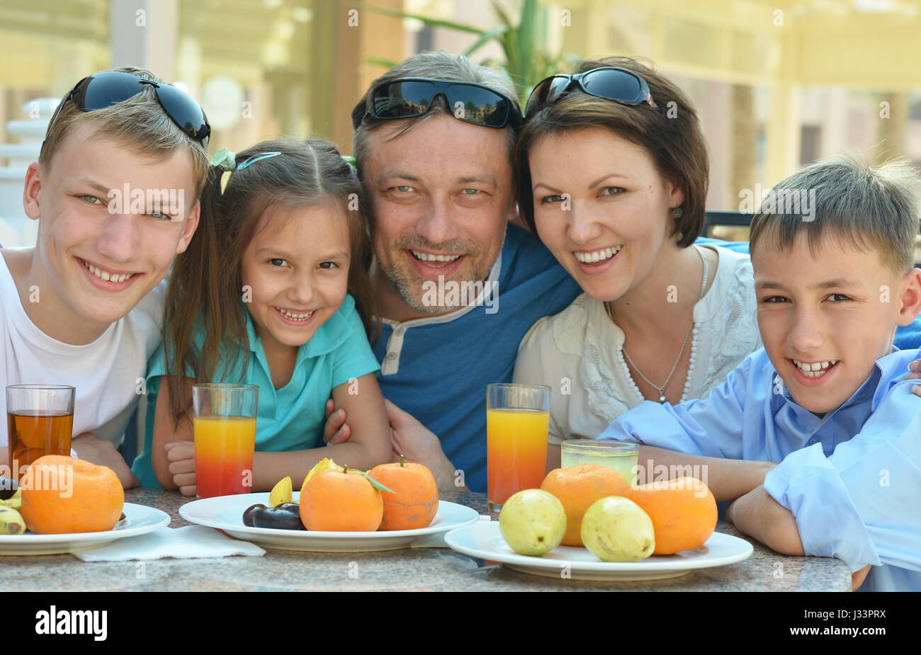 Caucasian children parents fresh fruit hi-res stock photography and ...