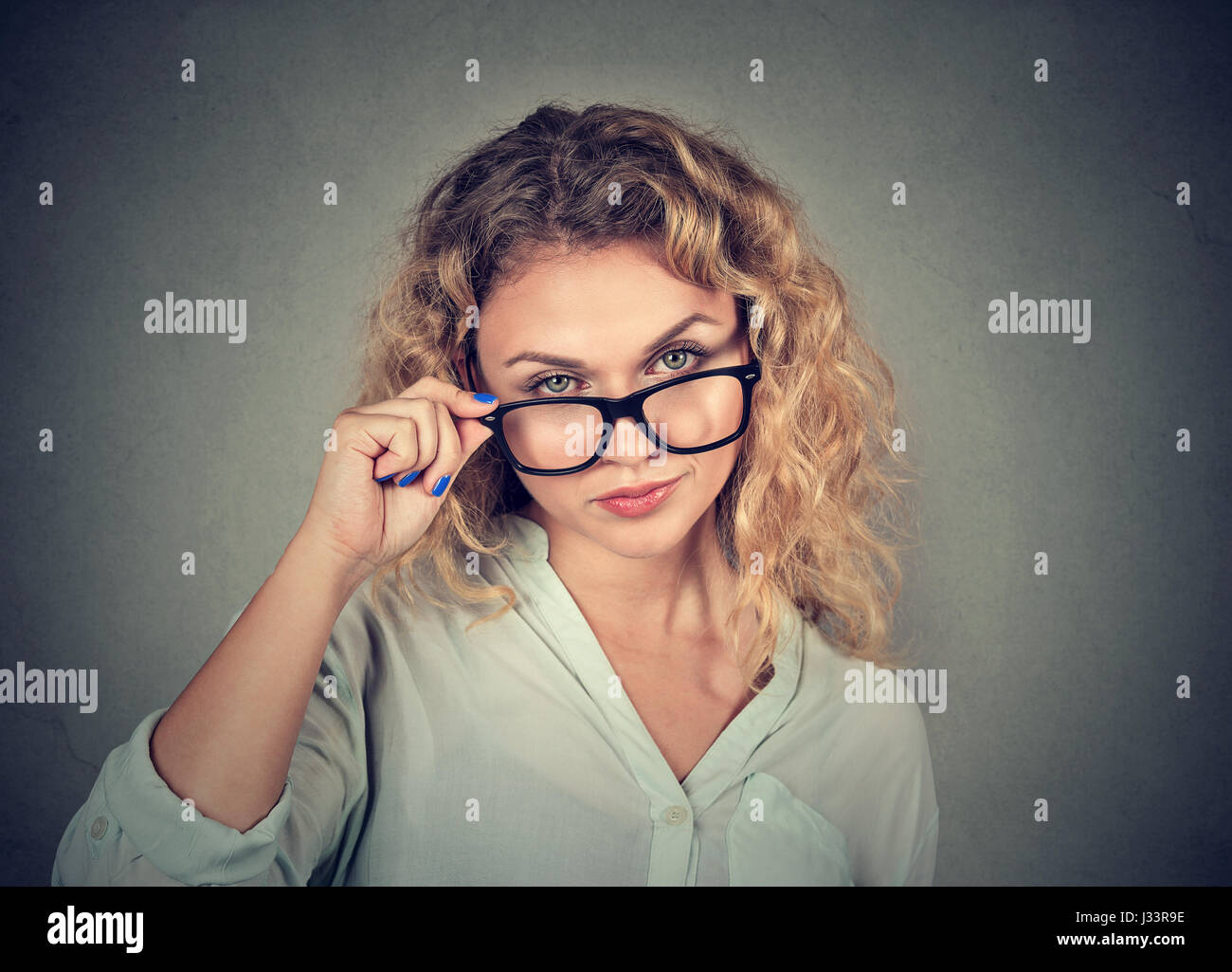 Strict looking woman hi-res stock photography and images - Alamy