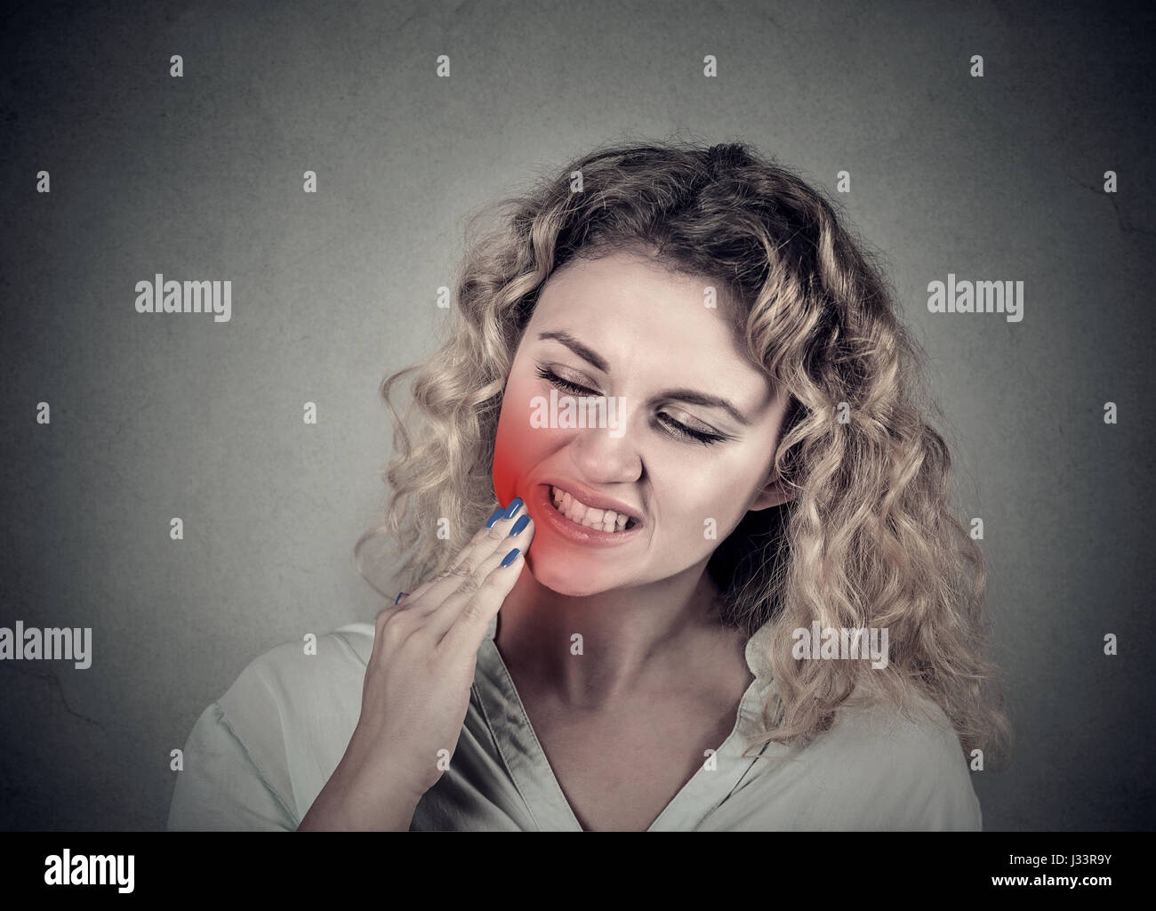 Closeup portrait young woman with sensitive tooth ache crown problem ...