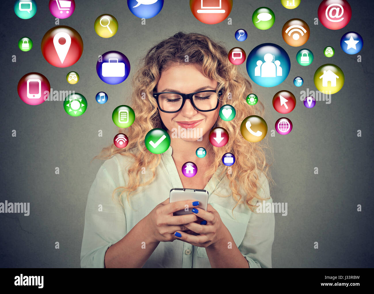 communication technology mobile high tech concept. Happy young woman ...