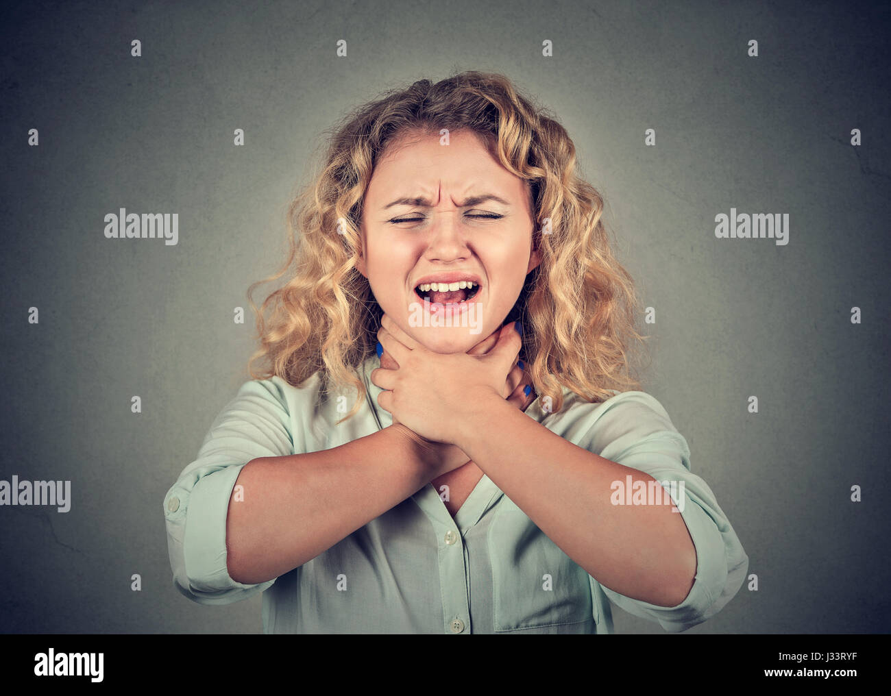 Choking woman hi-res stock photography and images - Alamy
