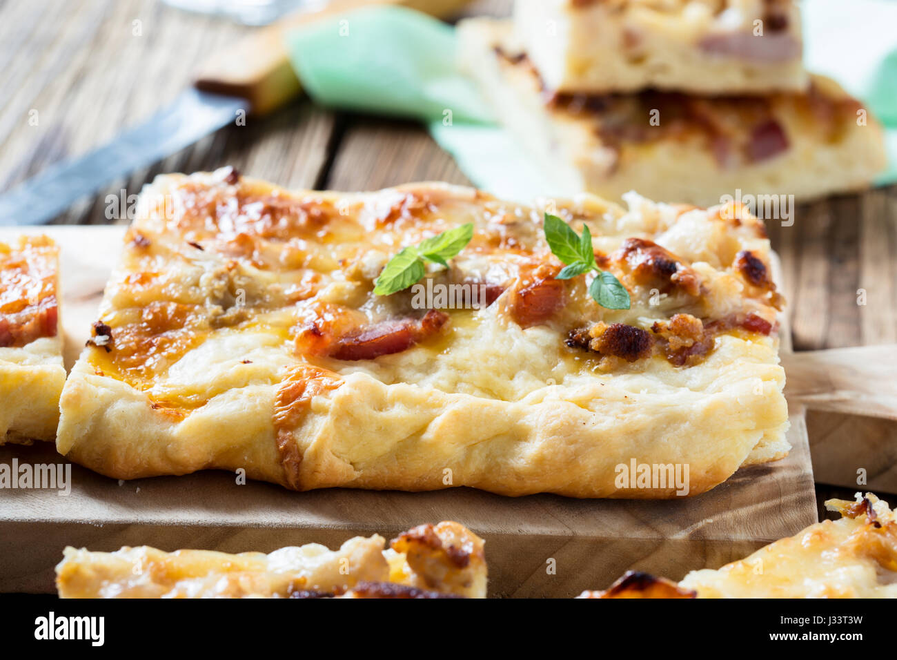 Flat bread with bacon, cauliflower and cheese Stock Photo - Alamy