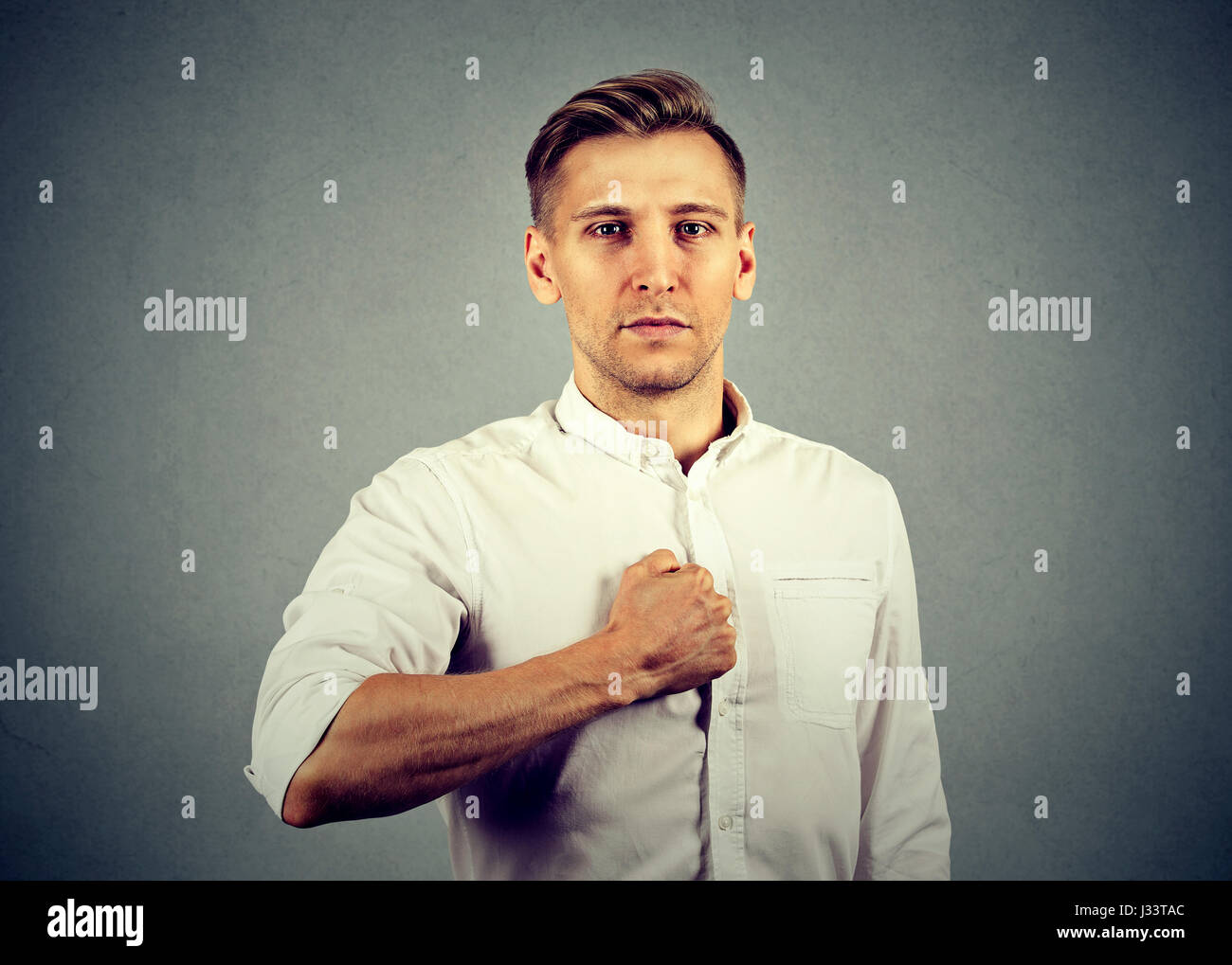 Portrait of a brave young man Stock Photo - Alamy