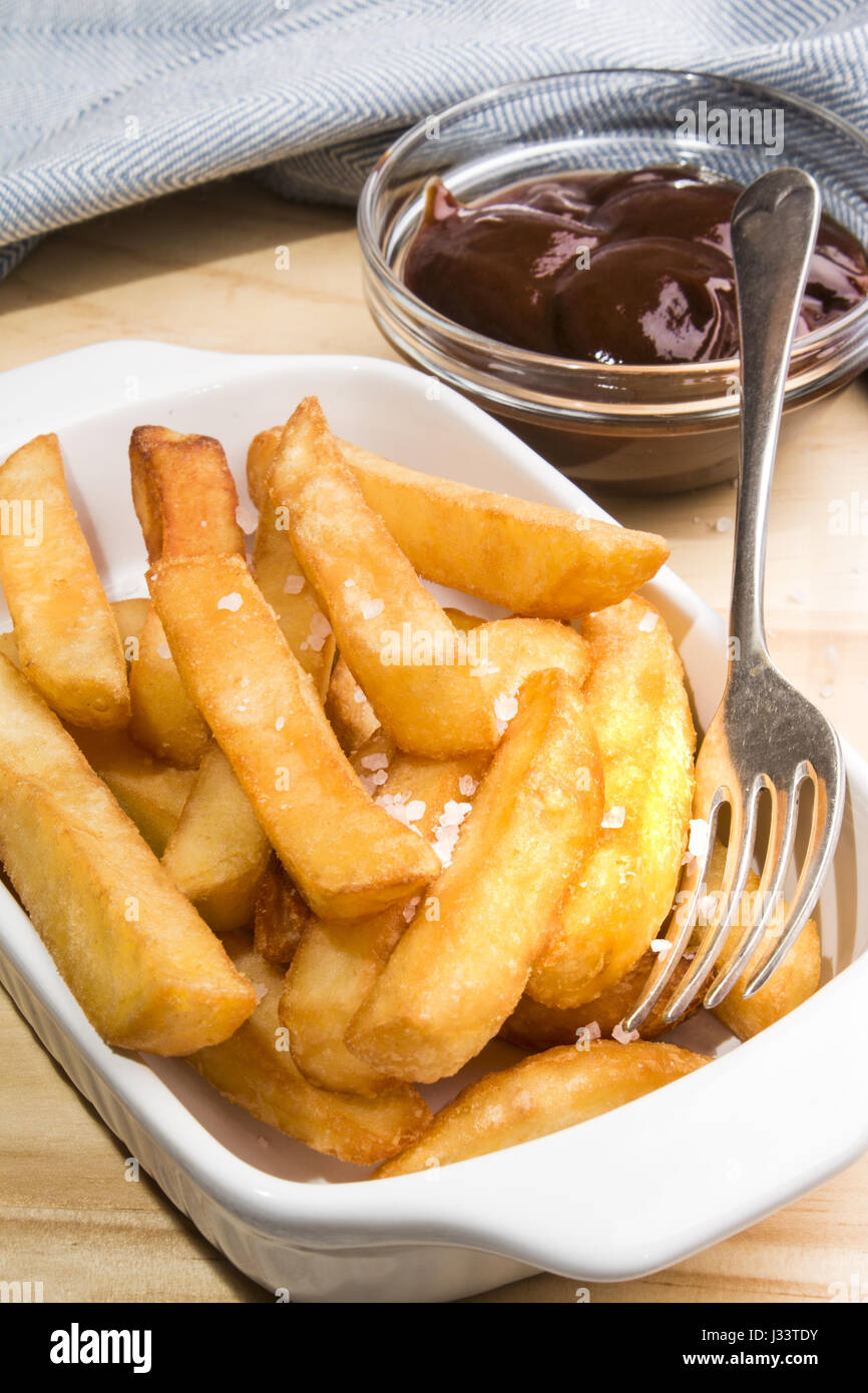 french fries with british brown sauce in a bowl Stock Photo - Alamy