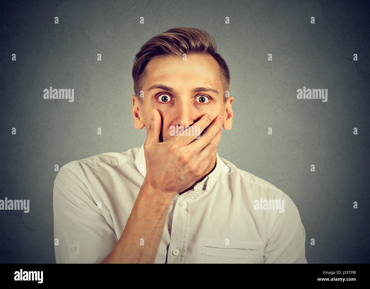 Concerned scared shocked man Stock Photo - Alamy
