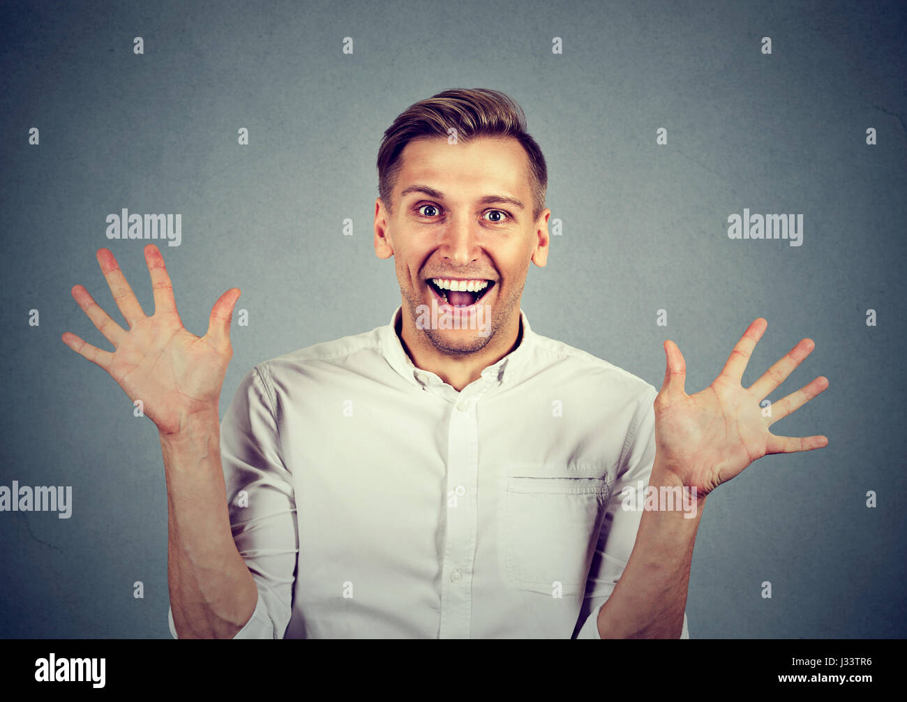 Happy handsome young man hi-res stock photography and images - Alamy