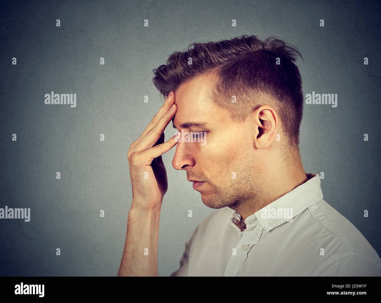 Side profile headshot sad depressed, alone, disappointed gloomy man ...