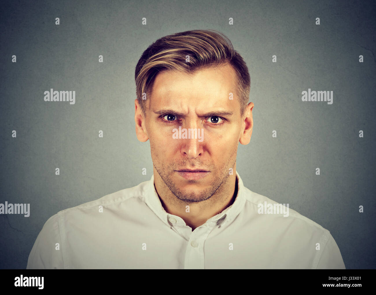 Angry serious man Stock Photo - Alamy