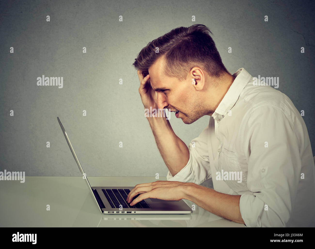 Stressed man mistake work hi-res stock photography and images - Alamy