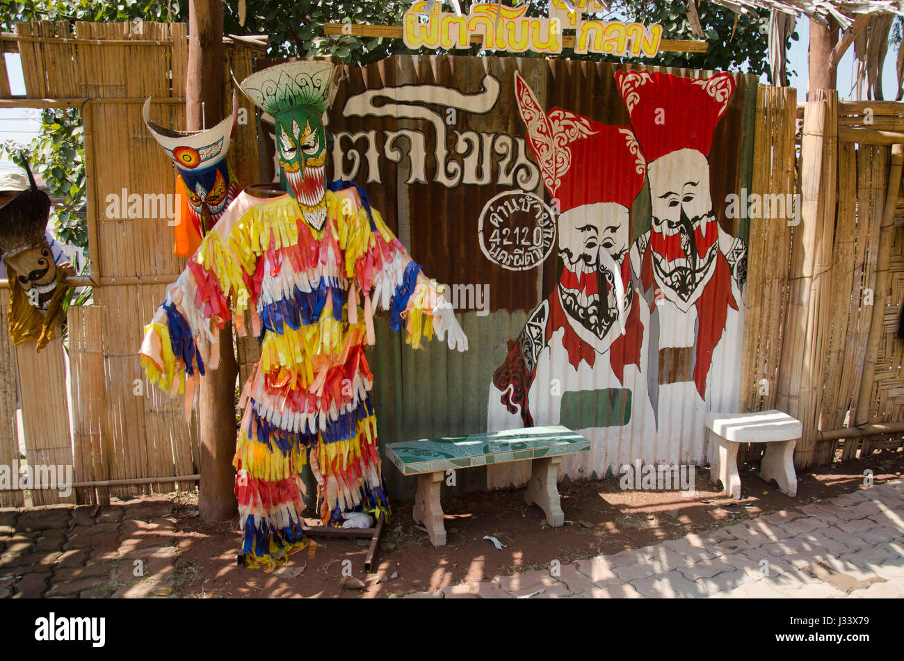 Mask and costume Phi Ta Khon of Ghost Festival also known as Bun Pha Wet for people visit at Phi ...