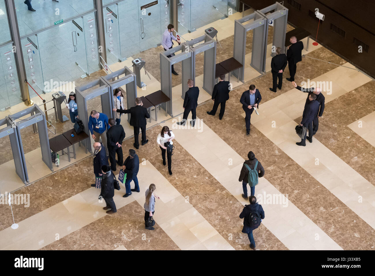 Visitors passing security check Stock Photo - Alamy