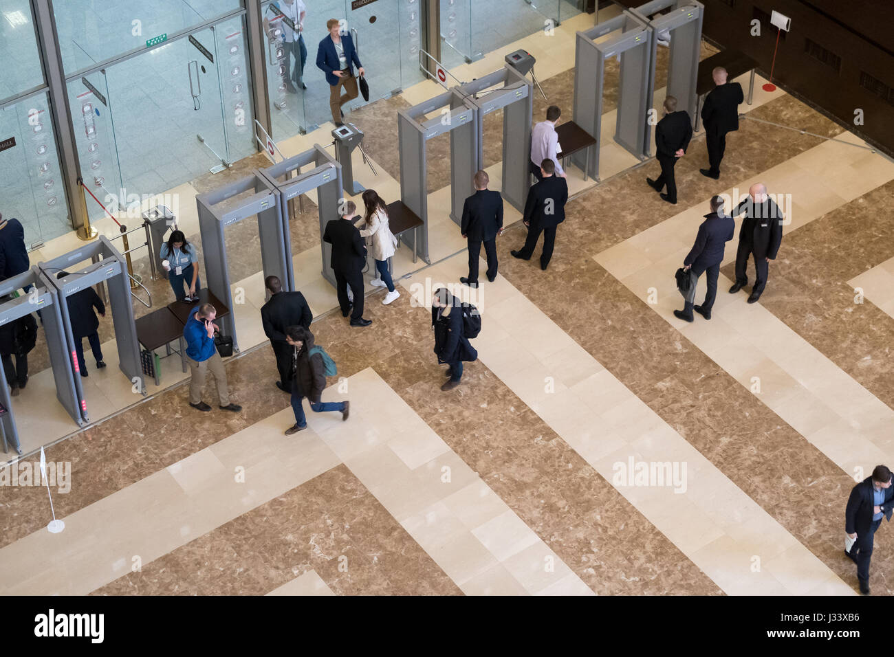 Visitors passing security check Stock Photo - Alamy