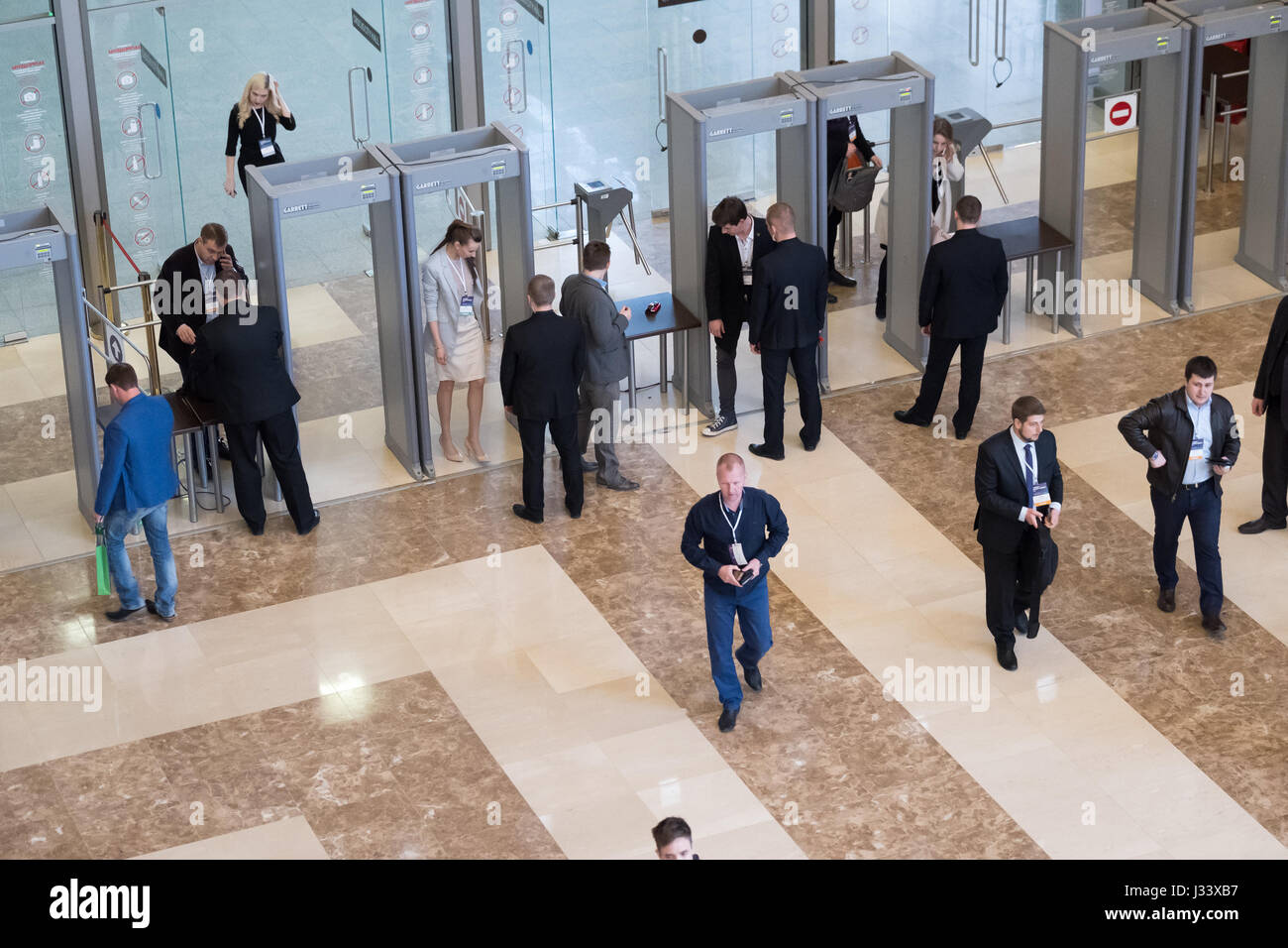 Visitors passing security check Stock Photo - Alamy