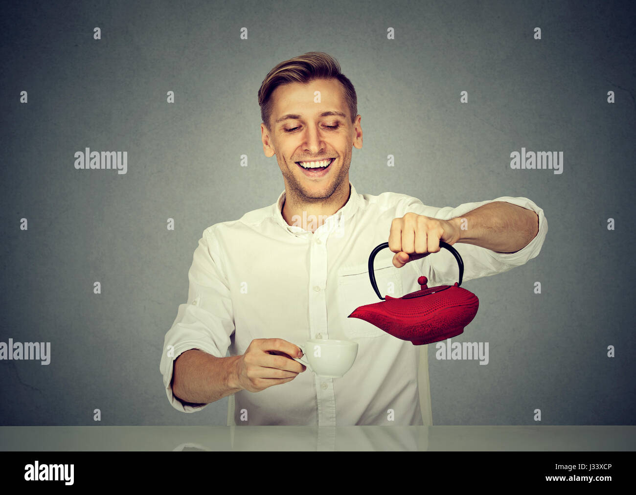 Man drinking tea Stock Photo - Alamy