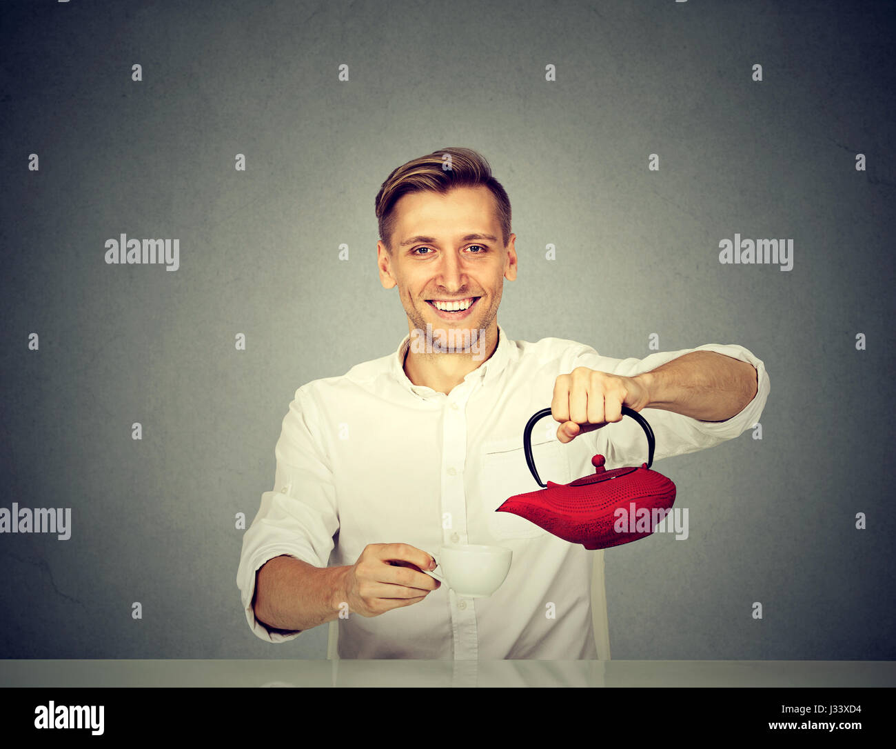 Man drinking tea Stock Photo - Alamy